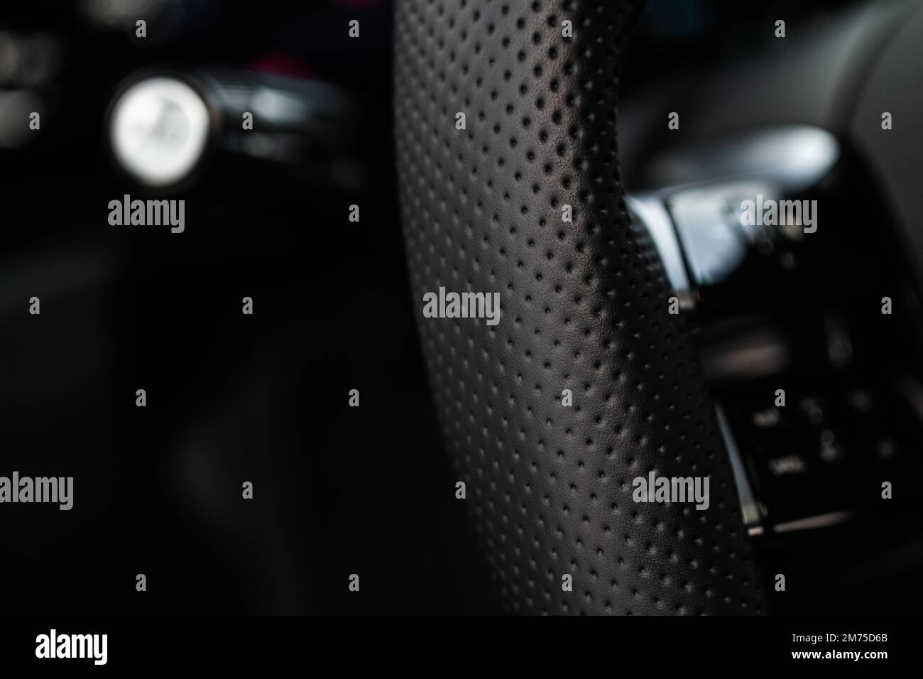 Close up modern car steering wheel Stock Photo - Alamy