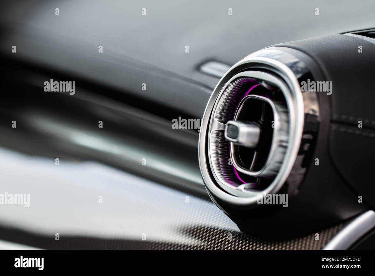 Car air conditioning close up view. The air conditioner flow inside the ...