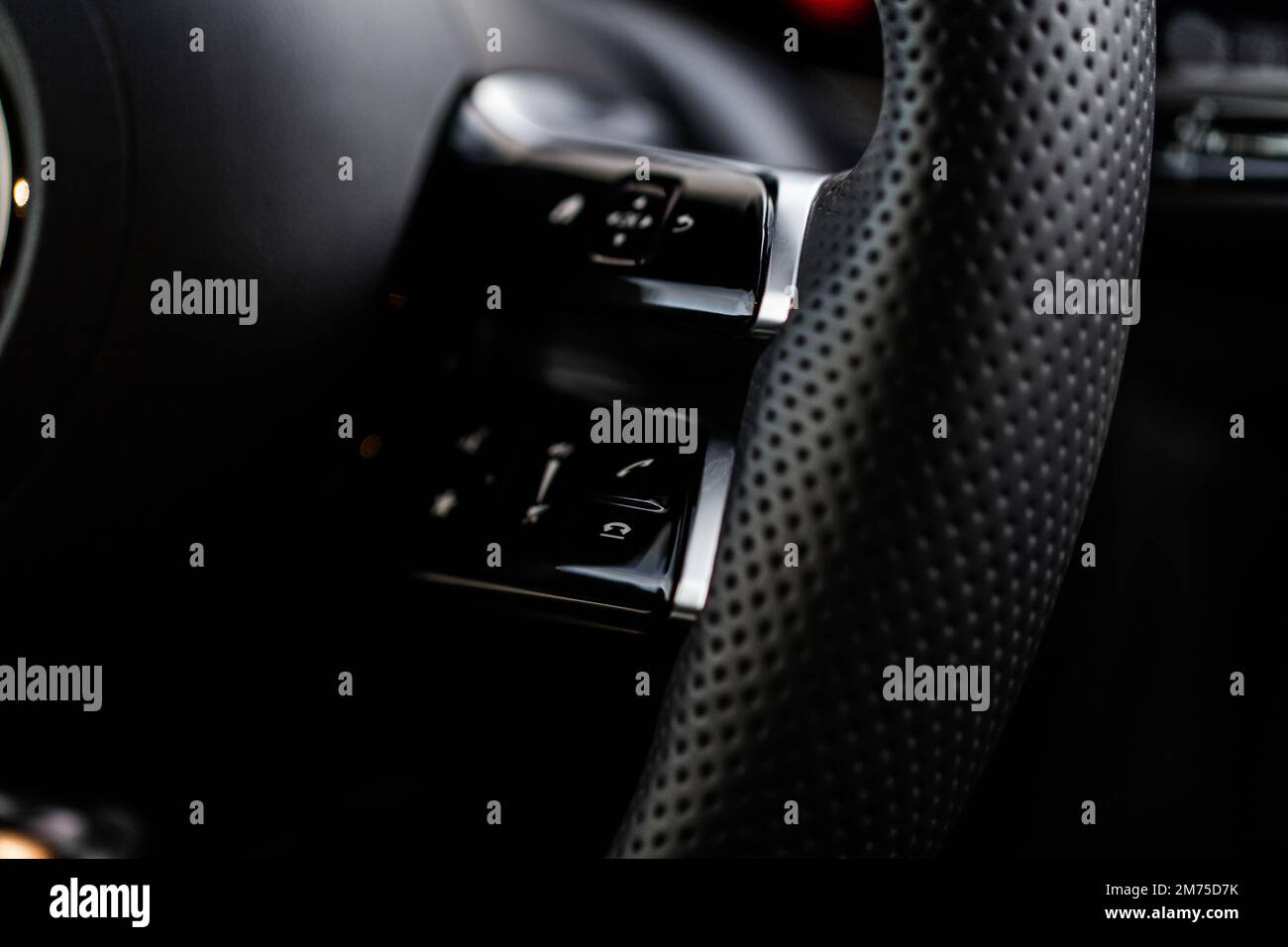 Call buttons on car steering wheel. Audio control buttons on the ...