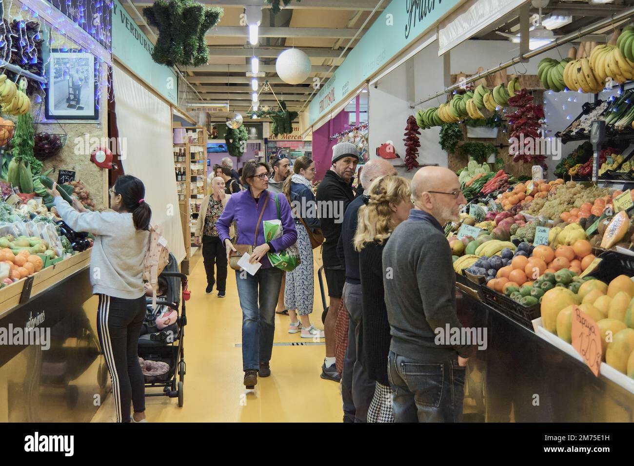 Tenerife, Spain - January 06, 2023: People doing their daily shopping ...