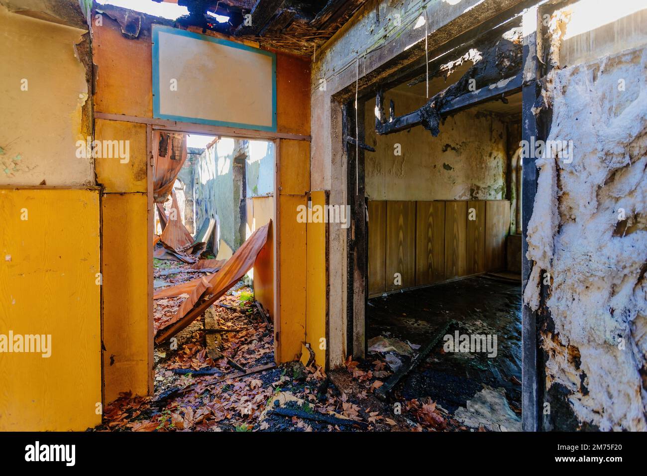 Burnt and ruined interior of office or apartment building. Consequences ...