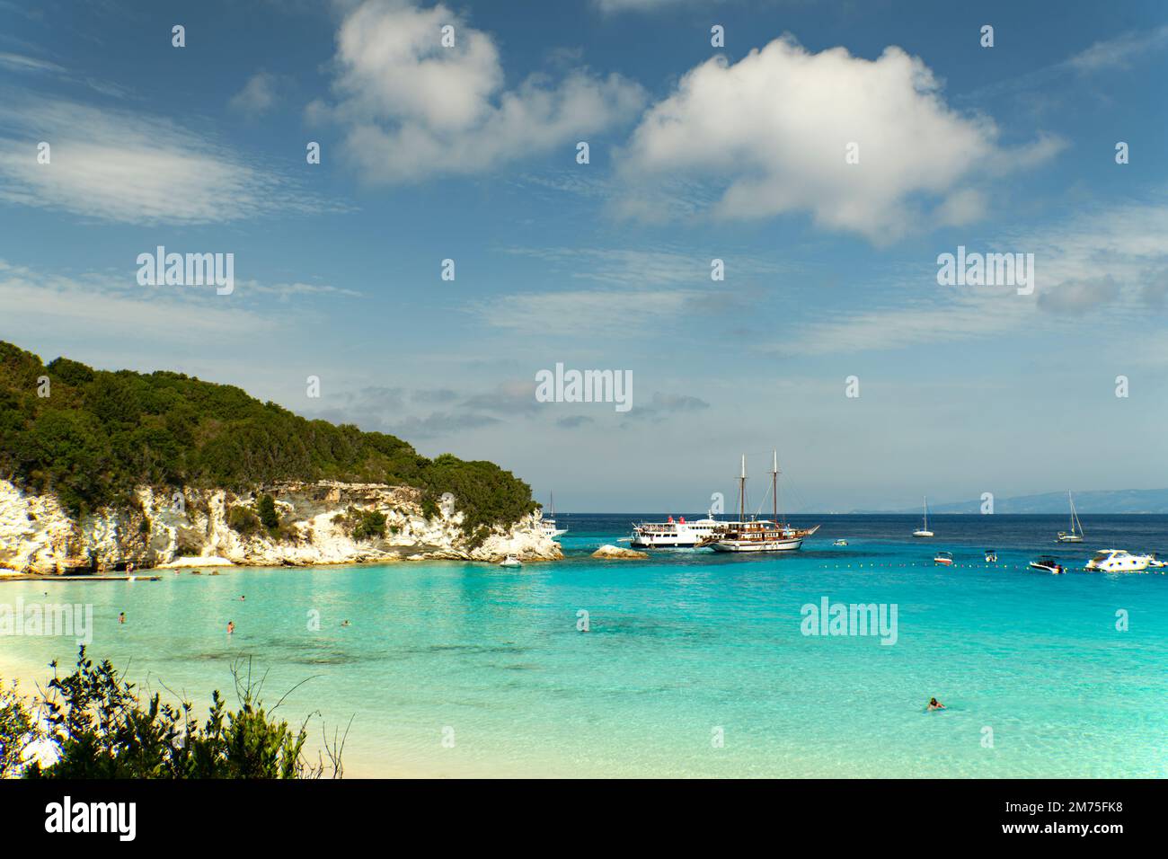 Tourist boats off Voutoumi Beach on Anti-Paxos, Ionian Islands, Greek ...
