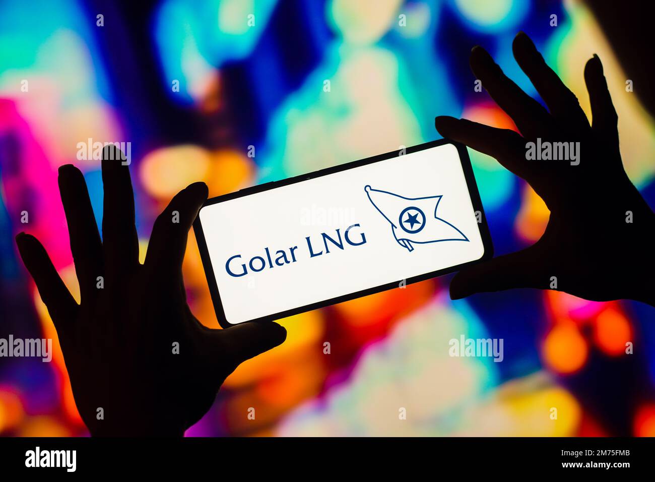 In this photo illustration, the Golar LNG logo is displayed on a ...