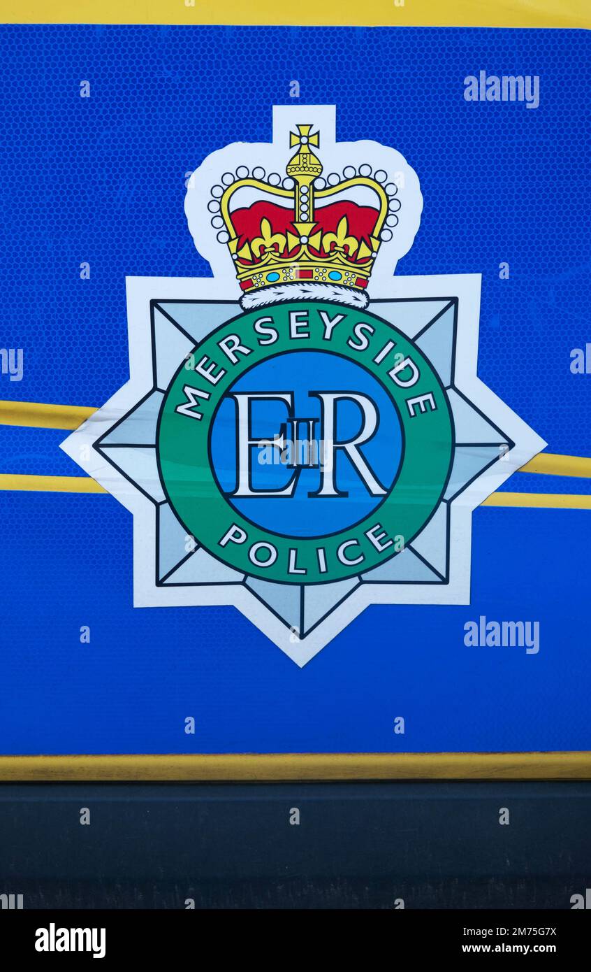 Logo and sign on the side of a Merseyside Police van Stock Photo - Alamy