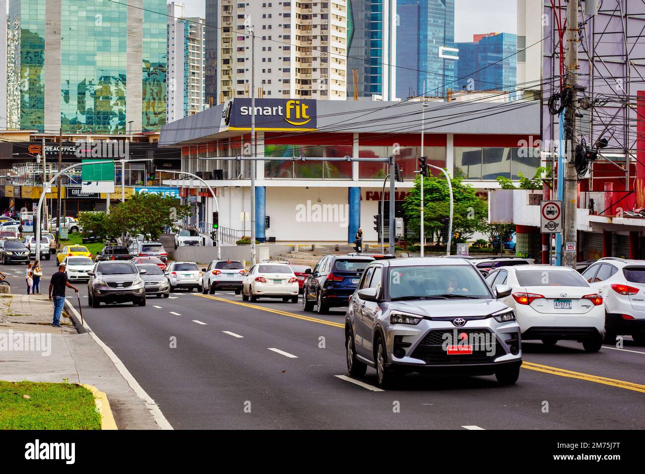 central street with traffic of many cars Stock Photo - Alamy