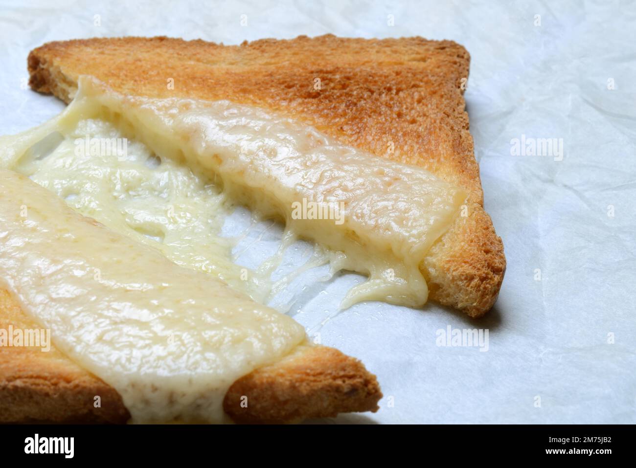 Melted processed cheese with toast, processed cheese Stock Photo - Alamy