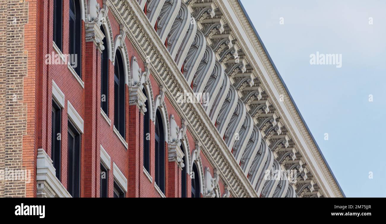 44 massive terra cotta brackets frame the top story windows and support ...