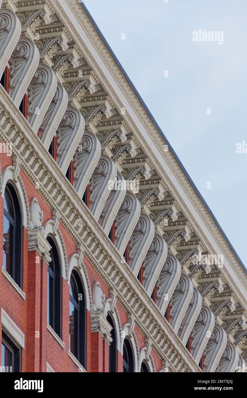 44 massive terra cotta brackets frame the top story windows and support ...