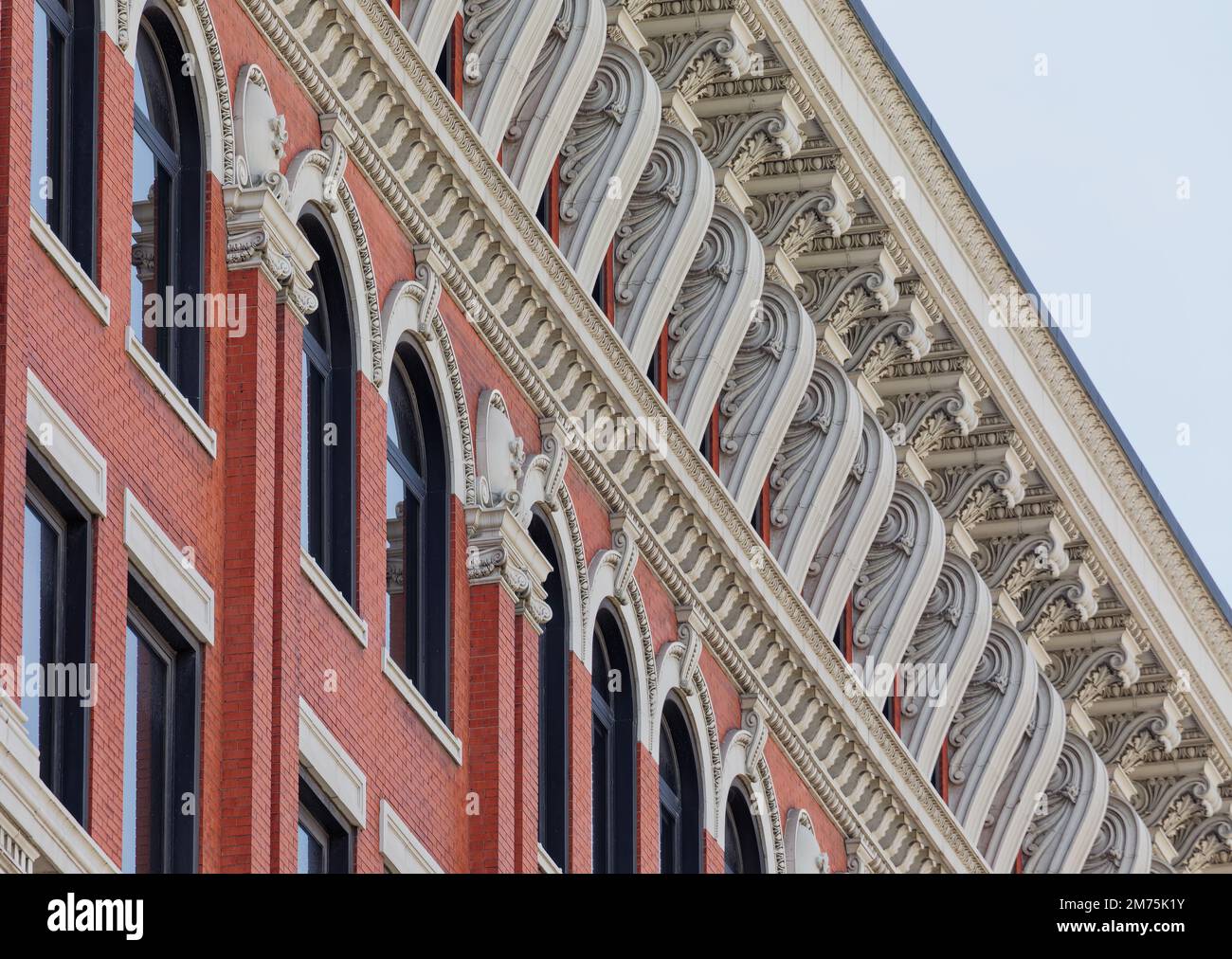 44 massive terra cotta brackets frame the top story windows and support ...