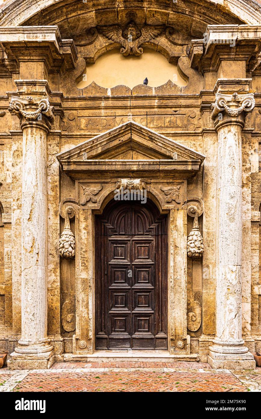 Historical house entrance gate of a palace, decorated with columns of ...