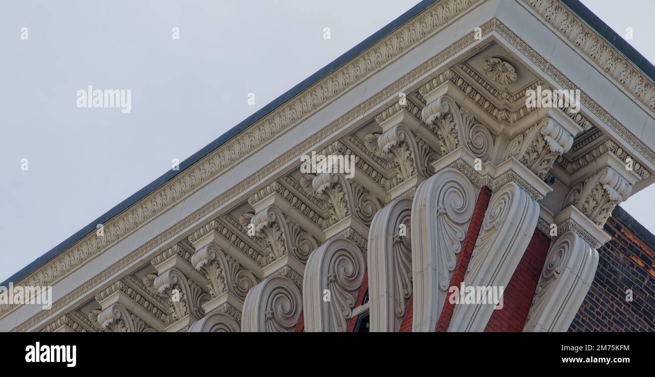 44 massive terra cotta brackets frame the top story windows and support ...