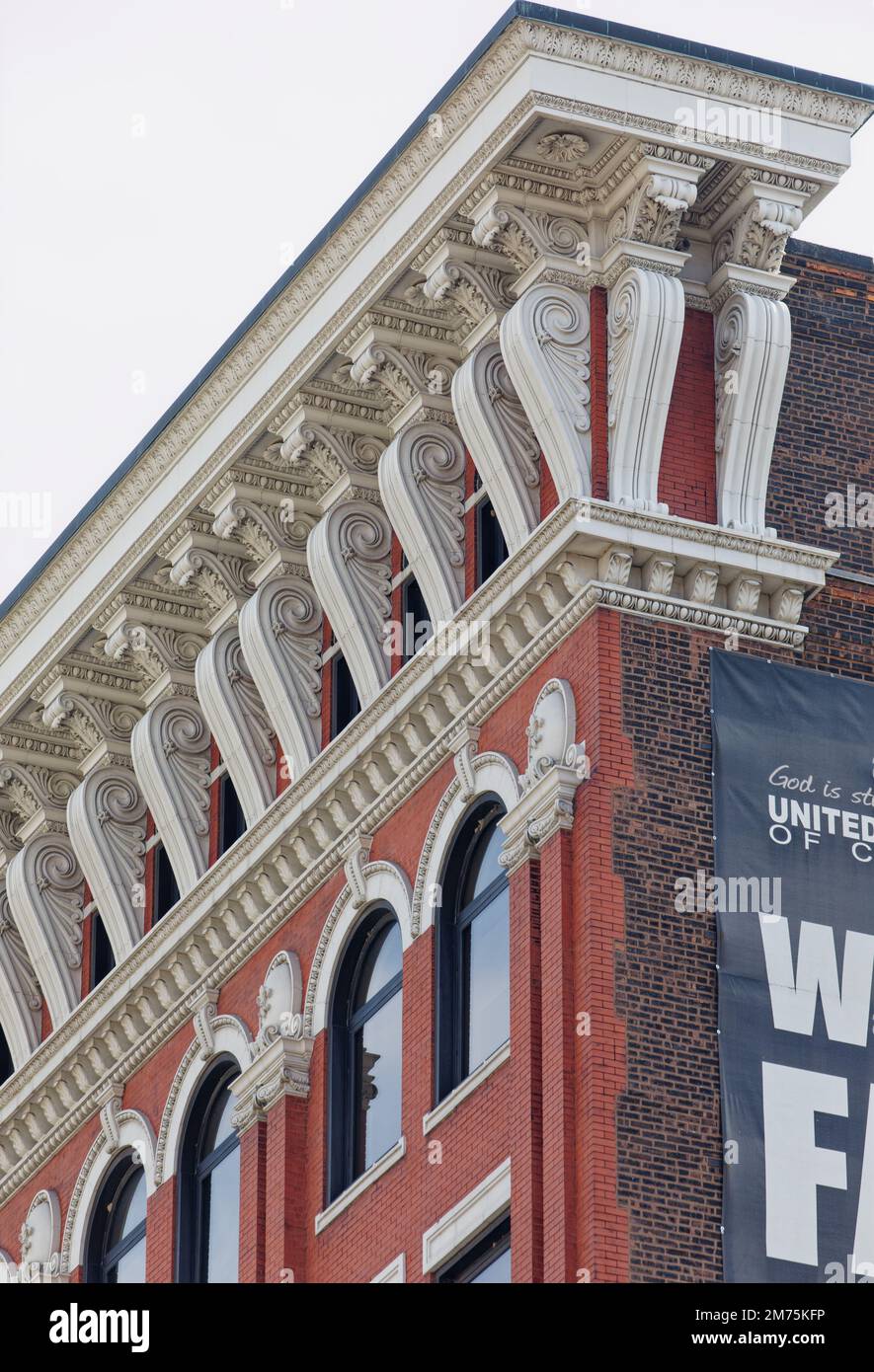 44 massive terra cotta brackets frame the top story windows and support ...