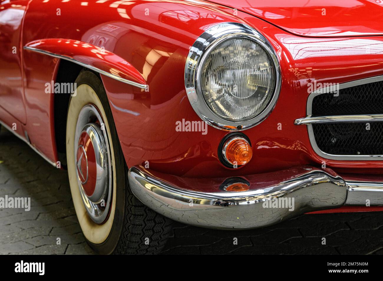 Detail photo of mudguard, round headlights, chromed bumper, whitewall ...