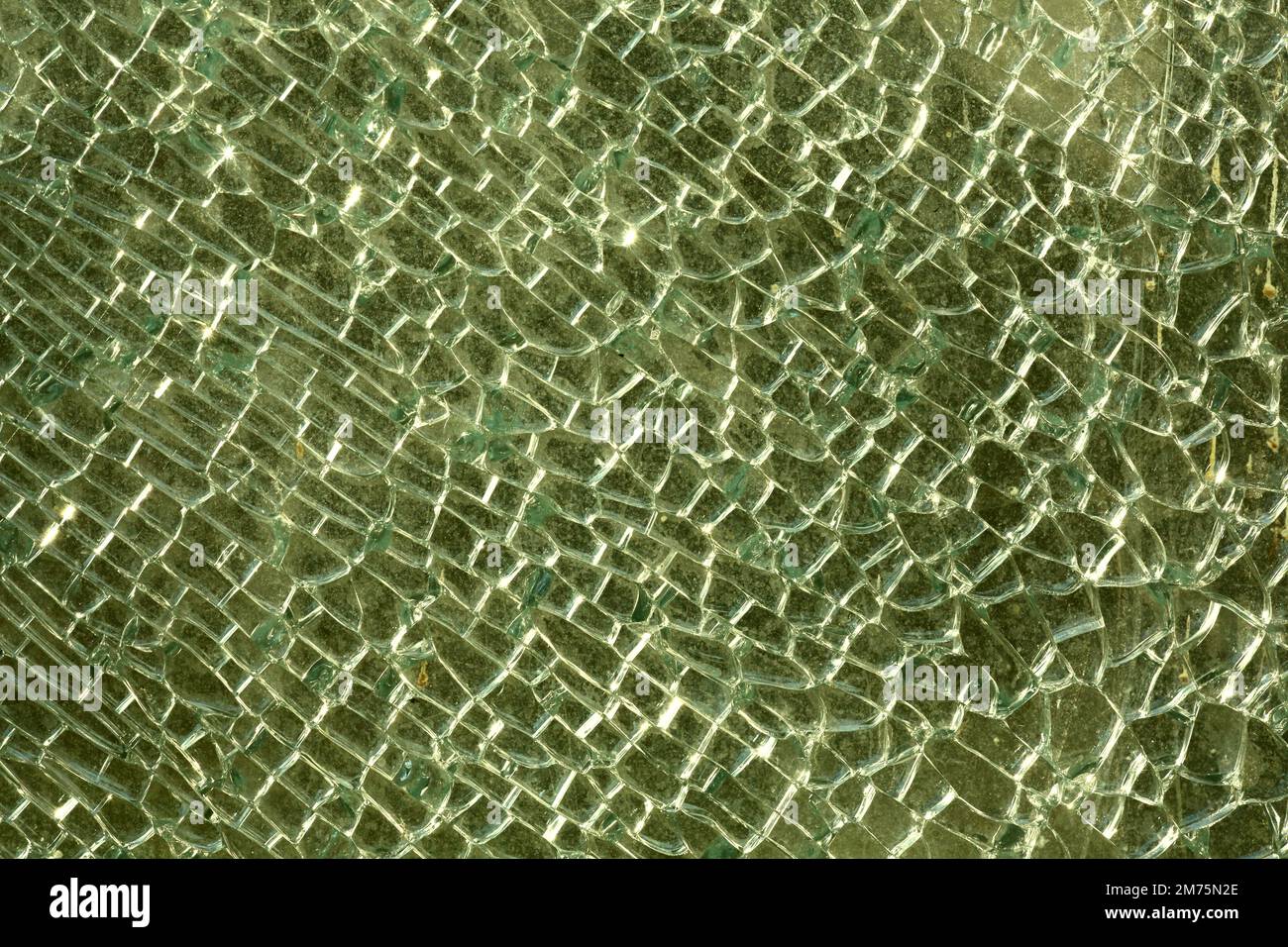 Shattered and broken glass pane with fractures, cracks and shapes Stock ...