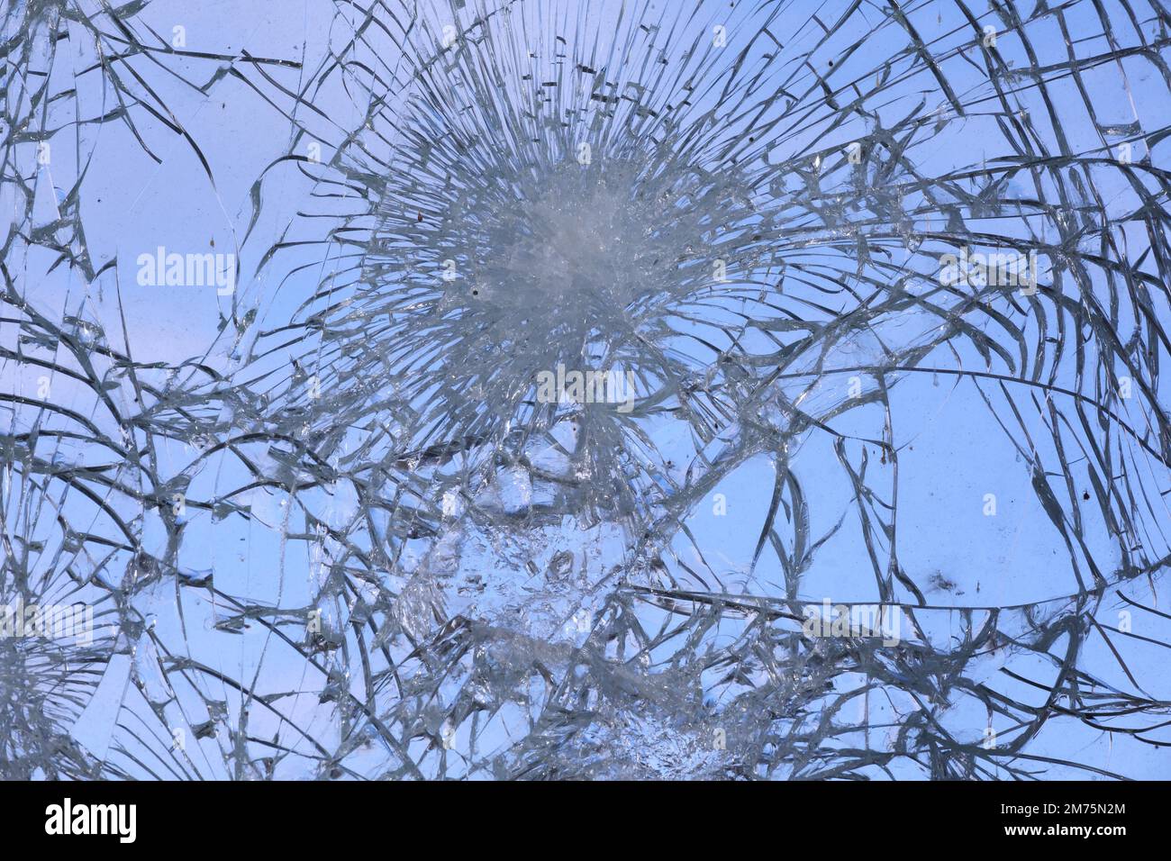 Shattered and broken glass pane with fractures, cracks and shapes Stock ...