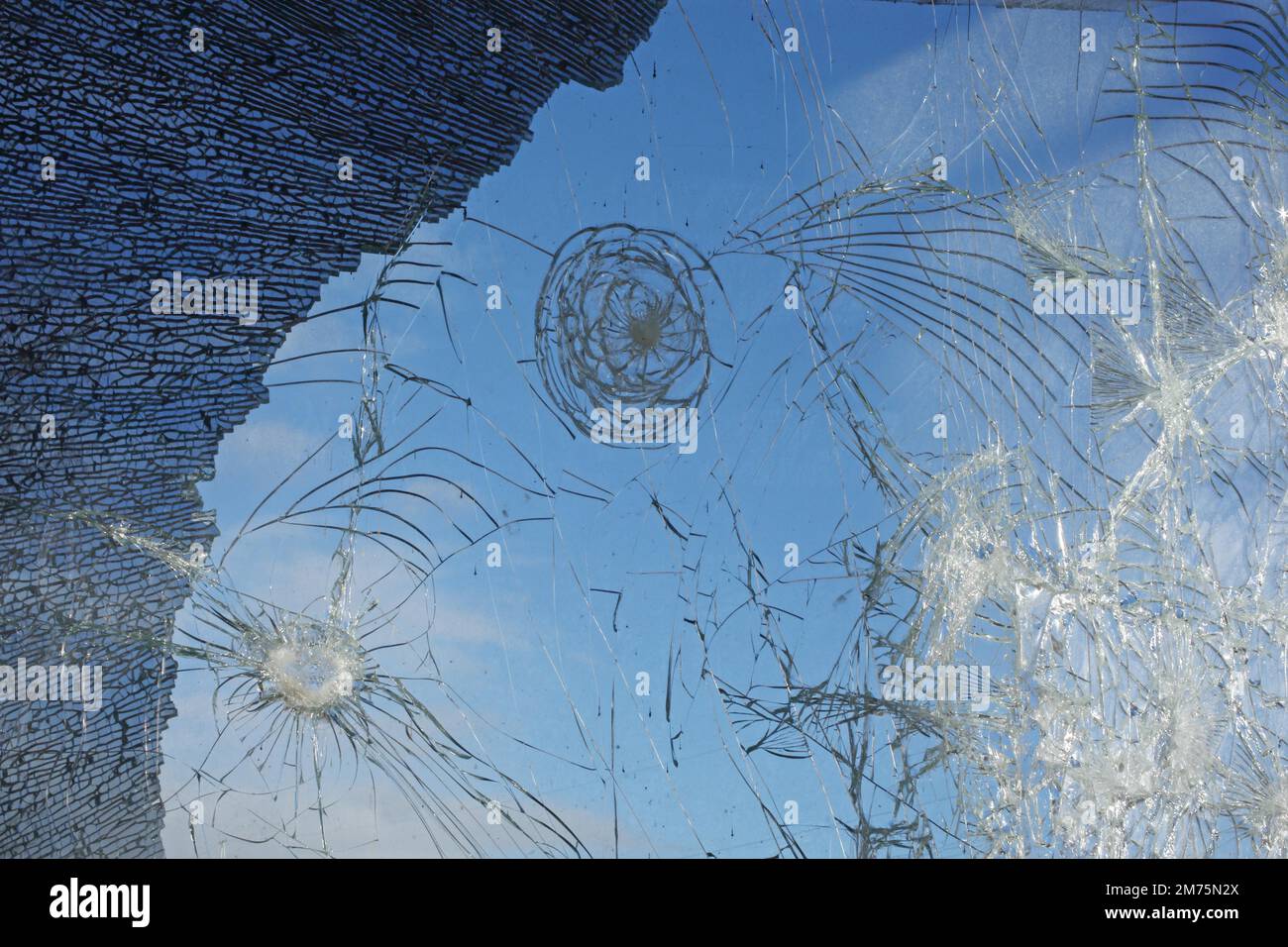 Shattered and broken glass pane with fractures, cracks and shapes Stock ...