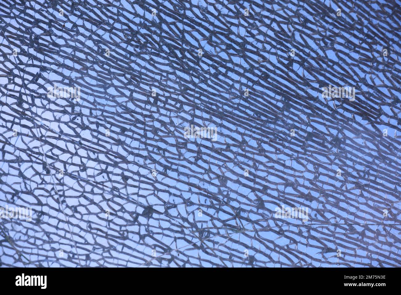 Shattered and broken glass pane with structure, cracks and lines Stock ...