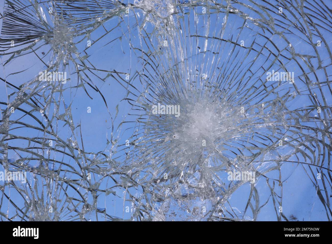 Shattered and broken glass pane with fractures, cracks and shapes Stock ...