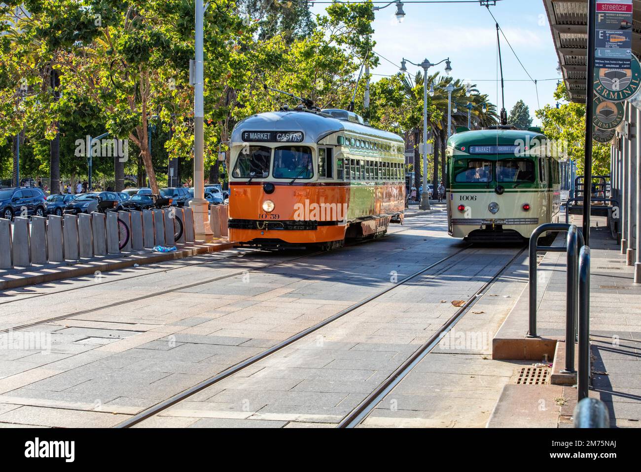 People with mask, Corona, tram, San Francisco harbour, California, USA ...