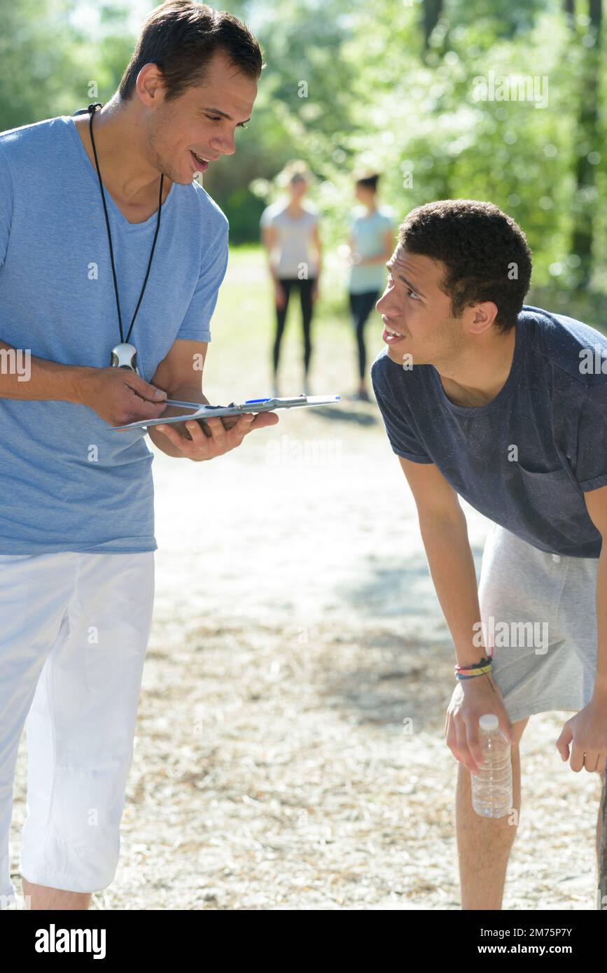 Marathon coach hi-res stock photography and images - Alamy