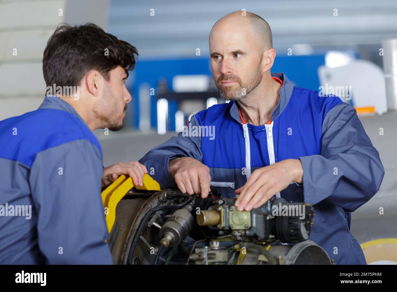 Metallic overalls hi-res stock photography and images - Alamy