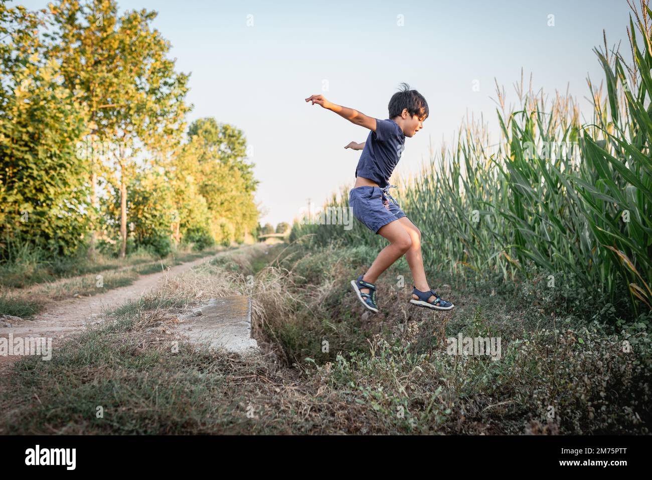 Girl in shorts jumping hi-res stock photography and images - Alamy