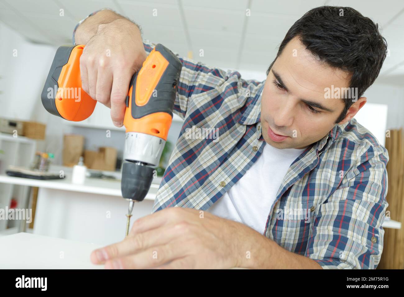 working man practising his skills in making drawer at workshop Stock ...