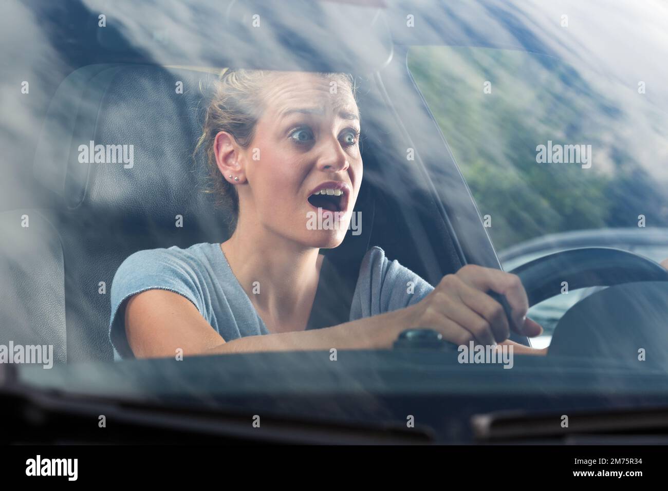 Female driver scared hi-res stock photography and images - Alamy