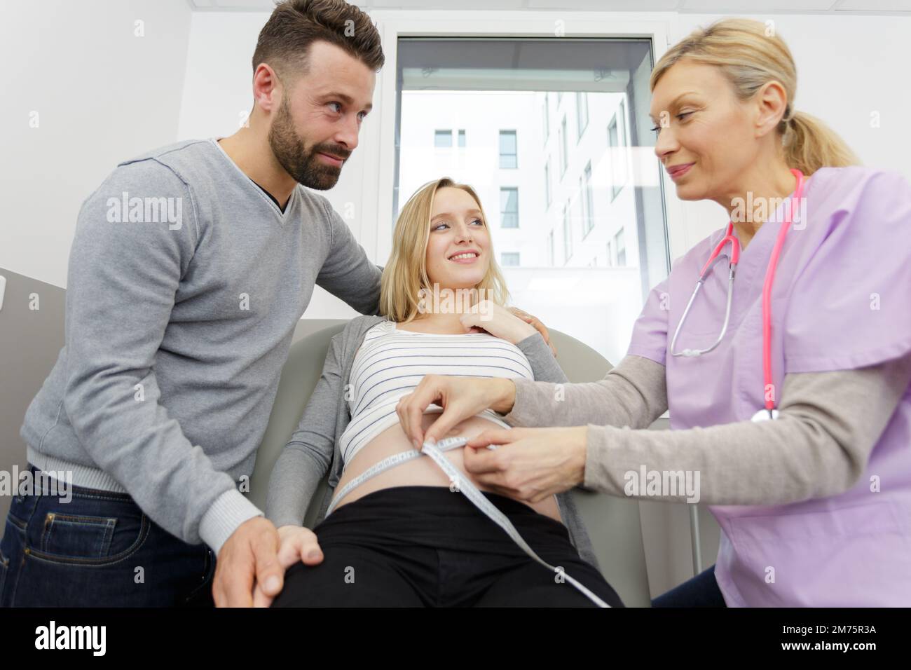 Pregnant measuring bump measurement hi-res stock photography and images ...