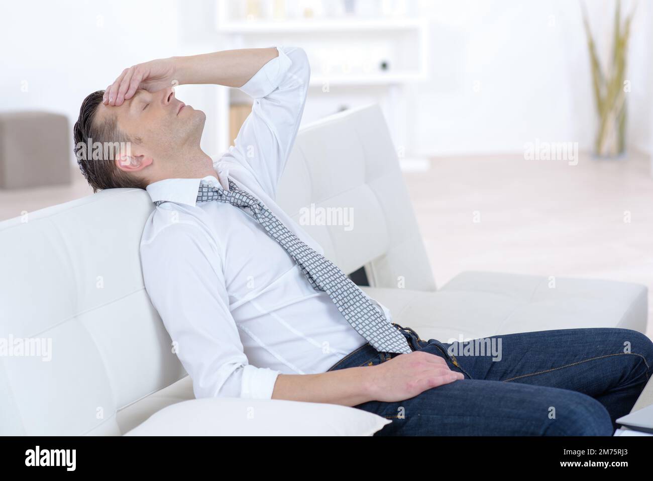 Businessman leaning back hi-res stock photography and images - Alamy