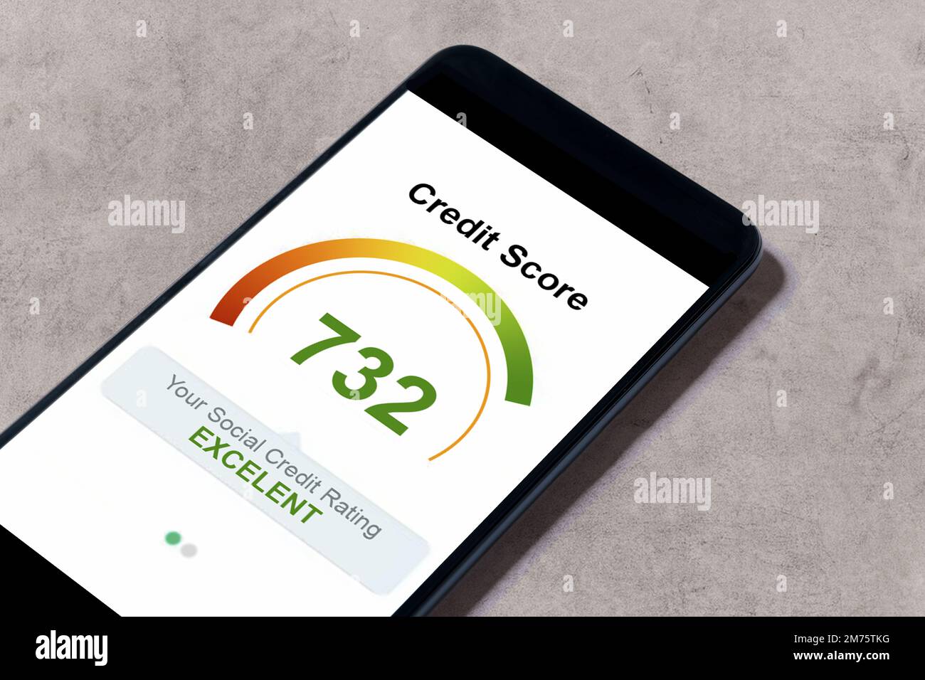 the smartphone lies on the table, shows the credit score application on ...