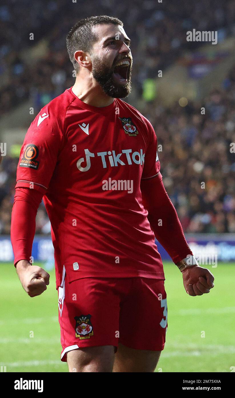 Coventry, UK. 7th Jan, 2023. Elliot Lee of Wrexham celebrates scoring ...