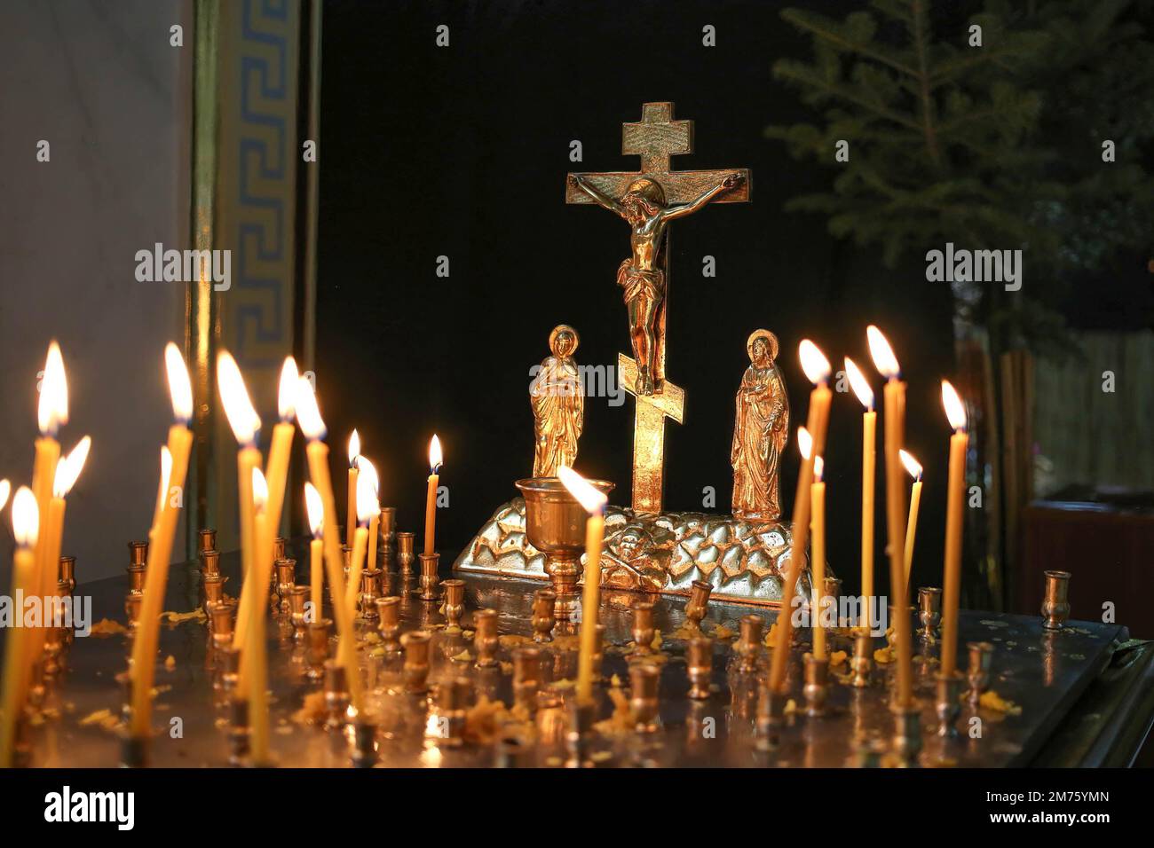 Odessa, Ukraine. 07th Jan, 2023. A crucifix with burning candles seen ...
