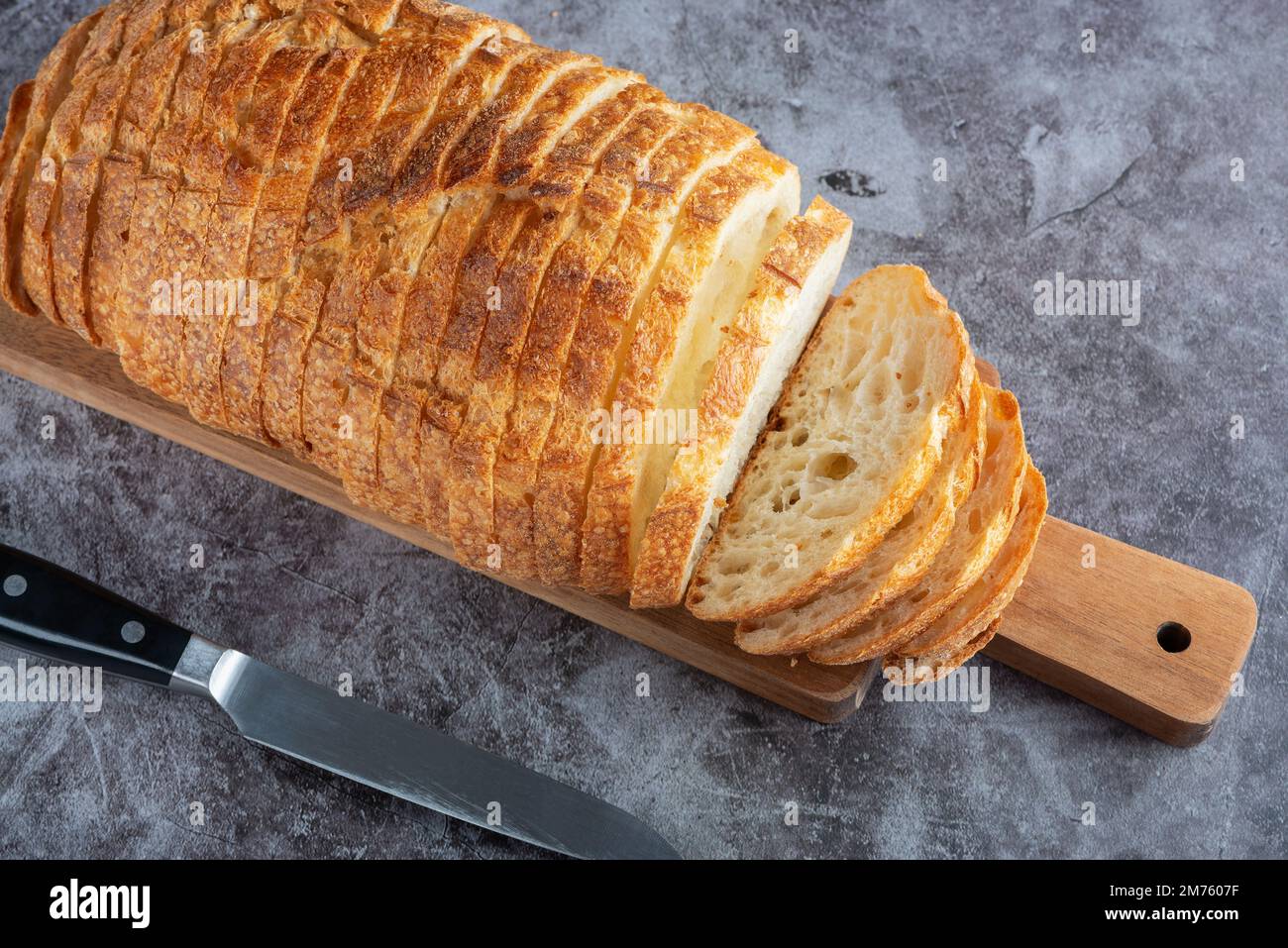 Fresh white loaf of bread on gray cement background. Top view Stock ...