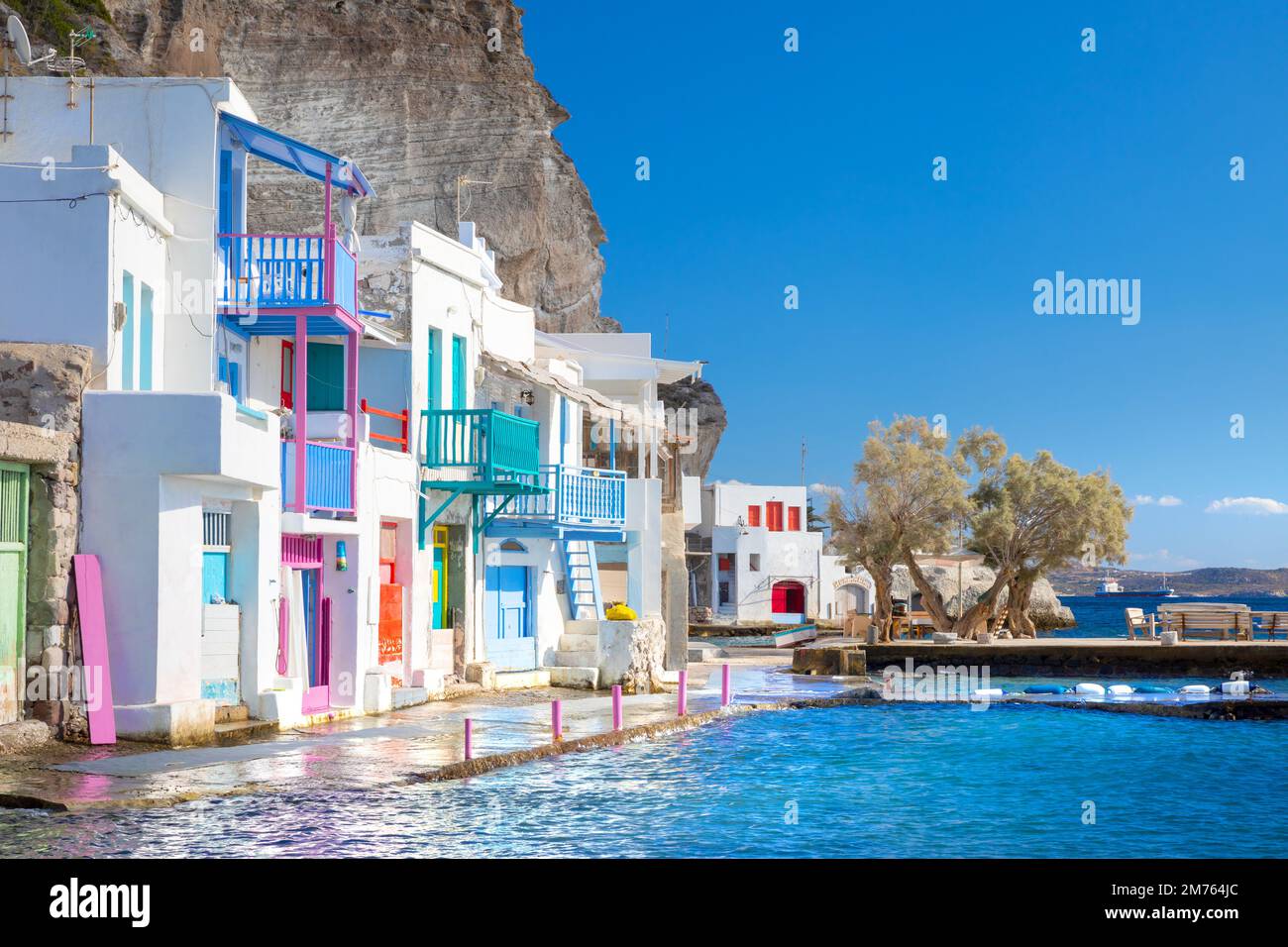 Vibrant fishing village of Klima with white houses and colorful doors ...