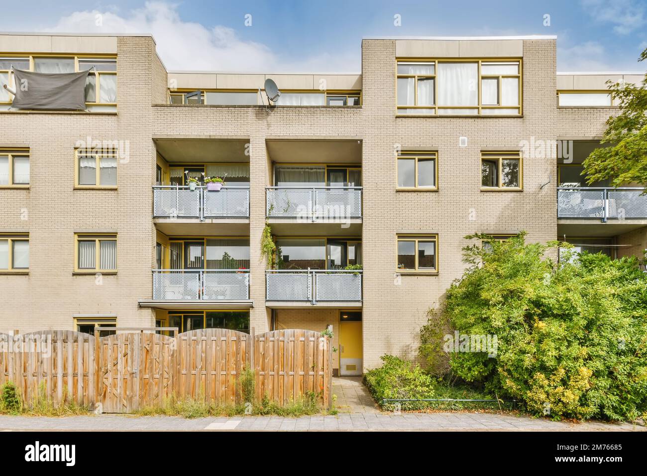 an apartment building with balks on the balconys and balks on the balks ...