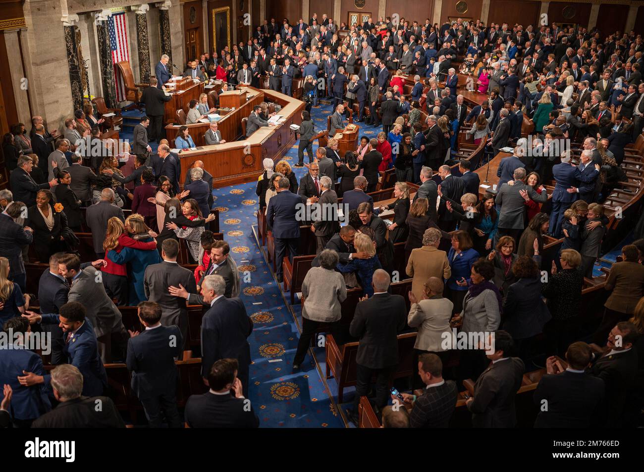 New members of Congress congratulate each other after they are sworn in ...