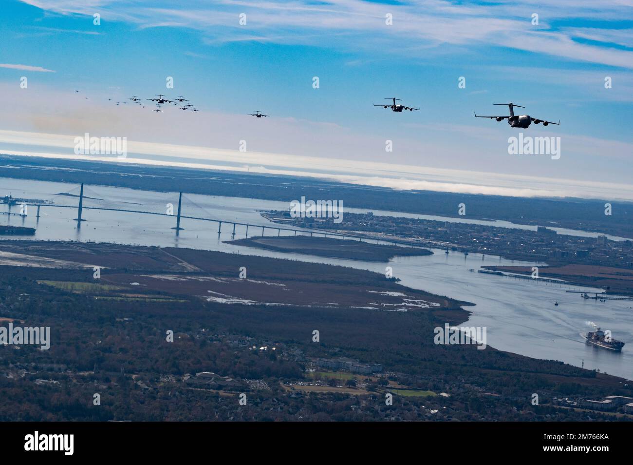 C-17 Globemaster III’s assigned to the 437th Airlift Wing fly over ...
