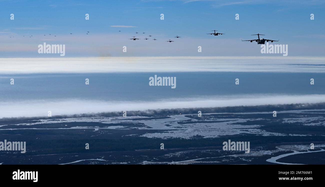 C-17 Globemaster III’s assigned to the 437th Airlift Wing fly over ...