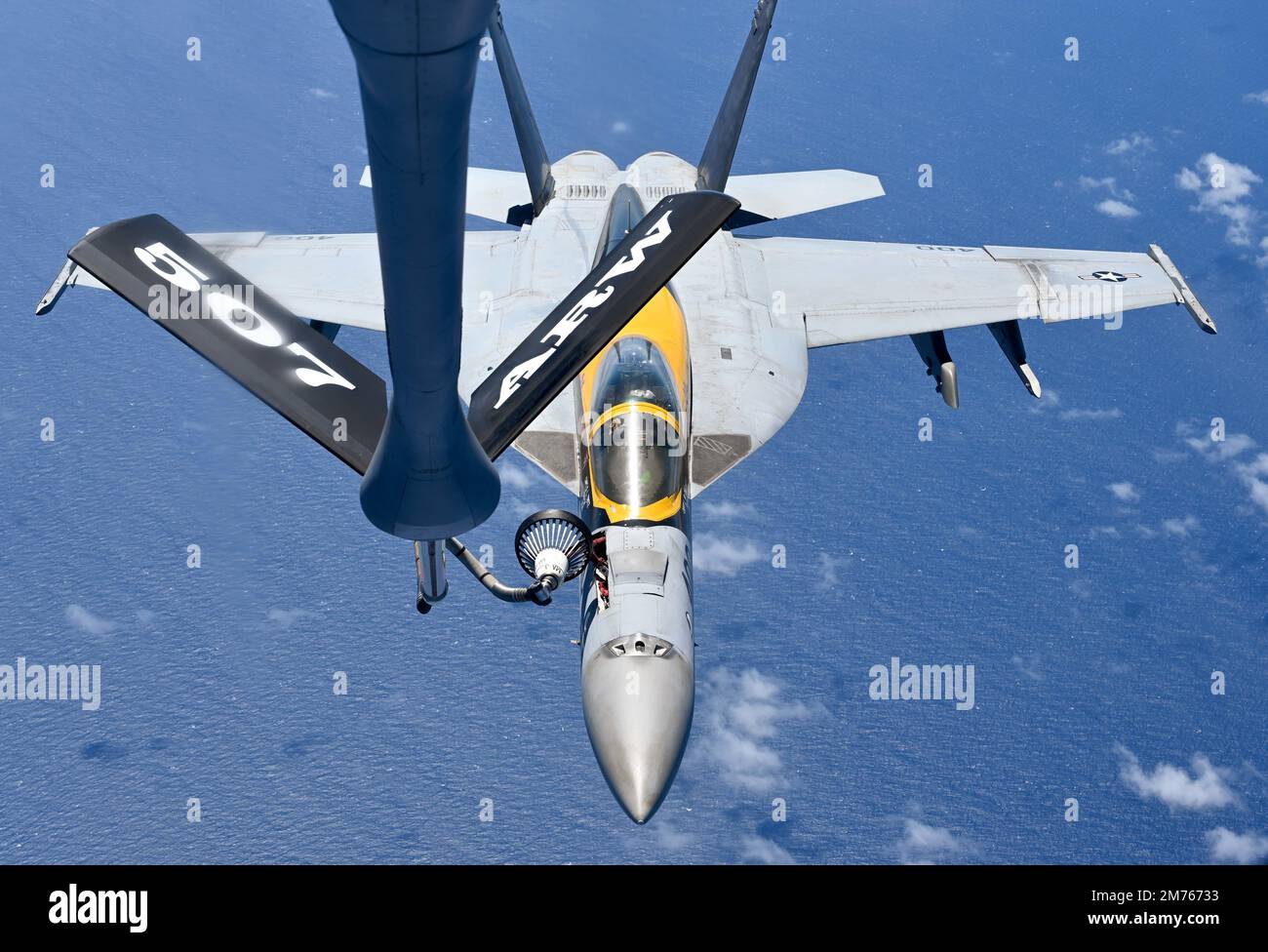 A U.S. Marine Corps F/A-18E Super Hornet receives fuel from the Okies ...