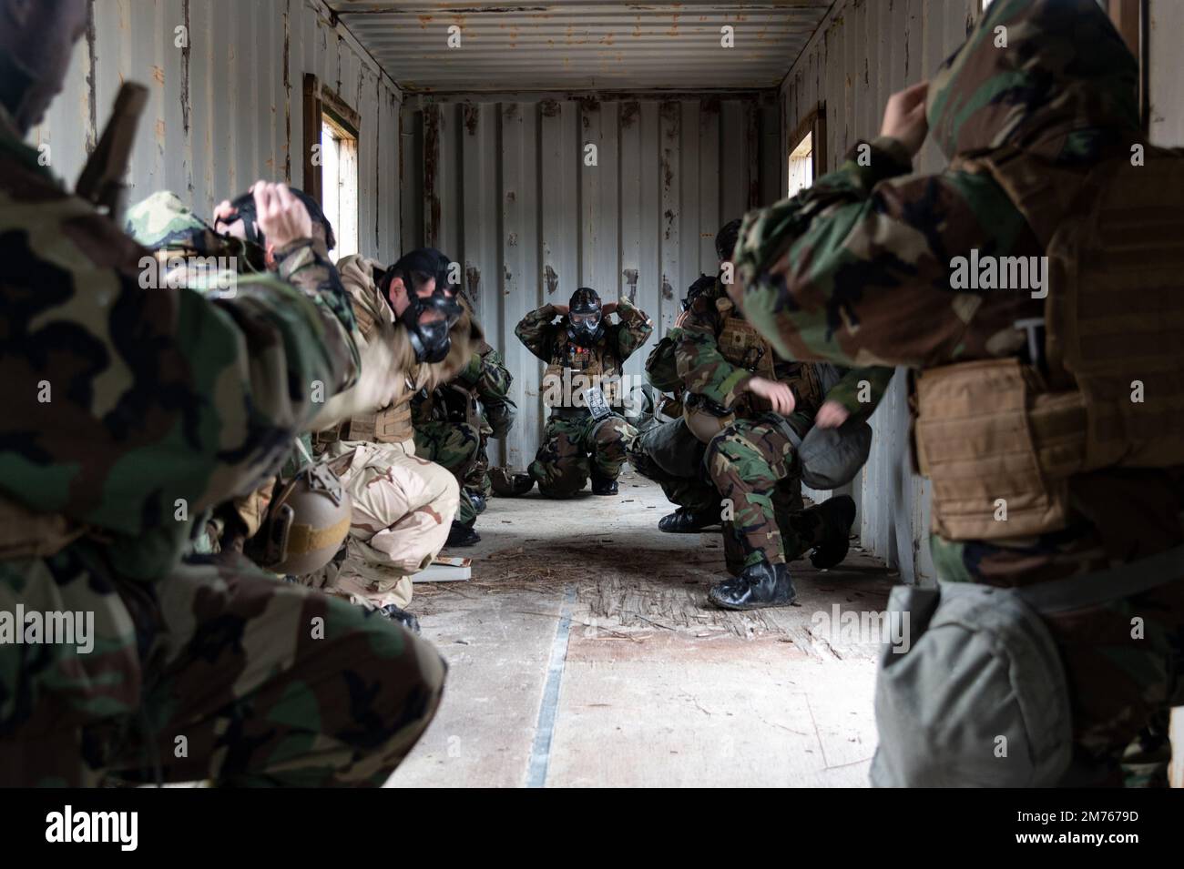 Airmen from the 321st Contingency Response Squadron don gas masks ...