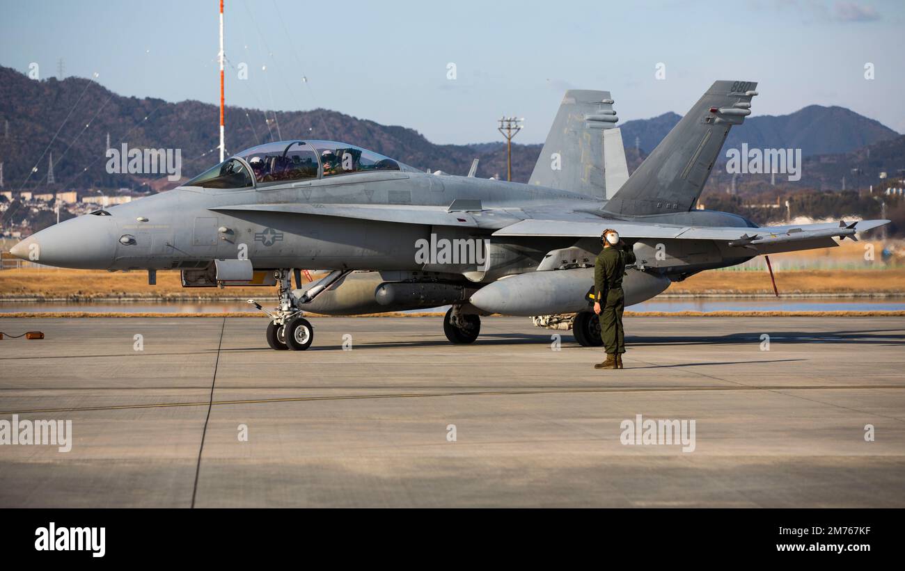 U.S. Marines with Marine Fighter Attack Squadron 312 exchange salutes ...