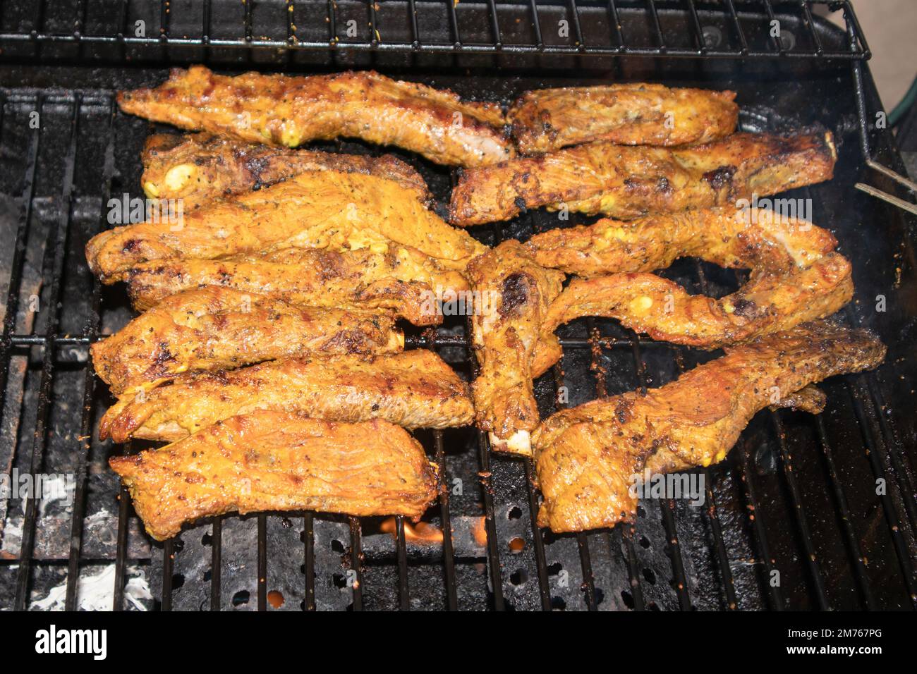 Barbecue ribs on a grill Stock Photo - Alamy