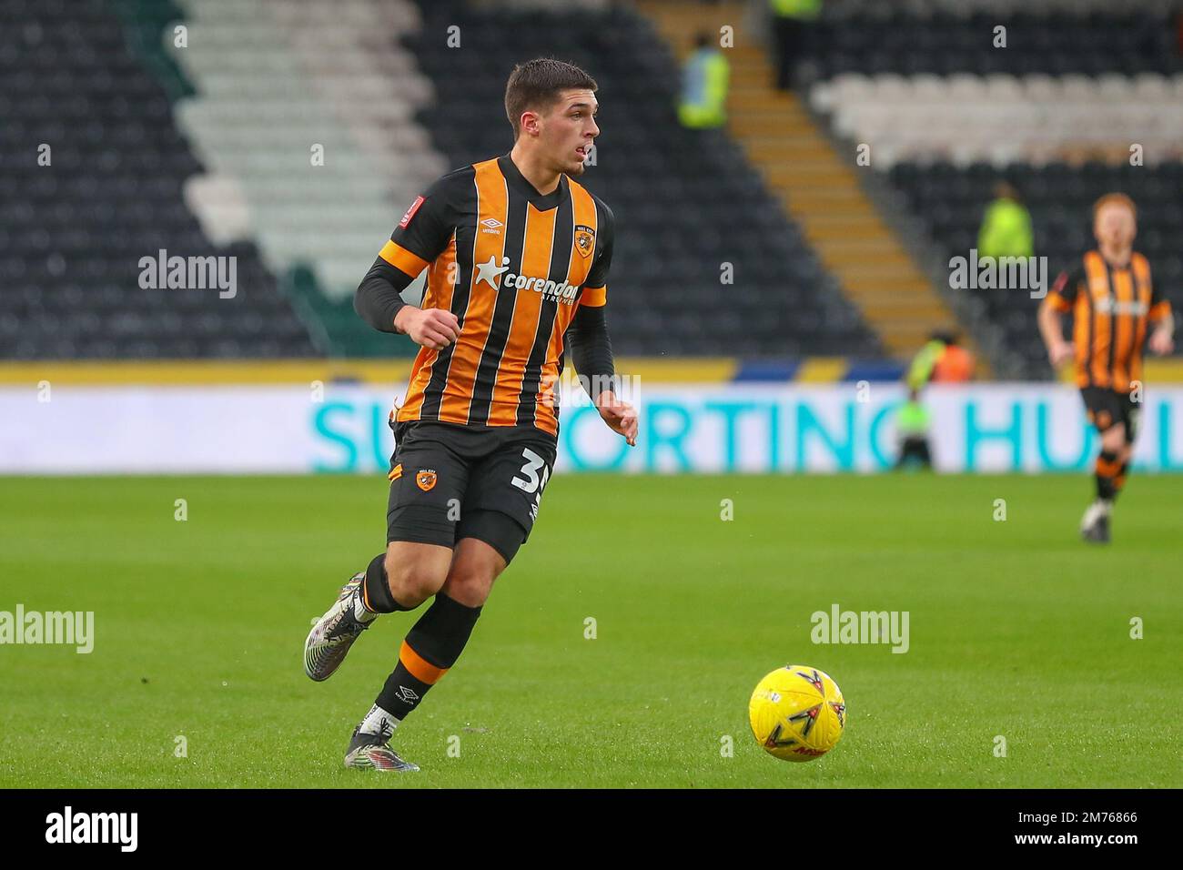 Xavier Simons #35 of Hull City runs with the ball during the Emirates ...