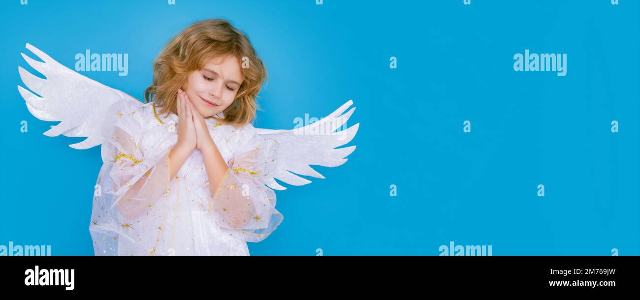 Cute angel kid, studio portrait. Wide banner panoramic header copyspace ...