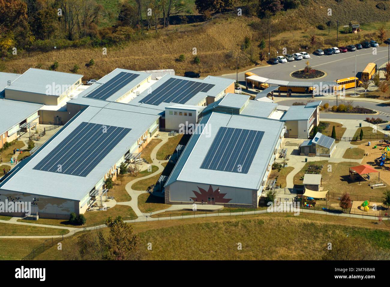 Aerial view of american school building with rooftop covered with ...