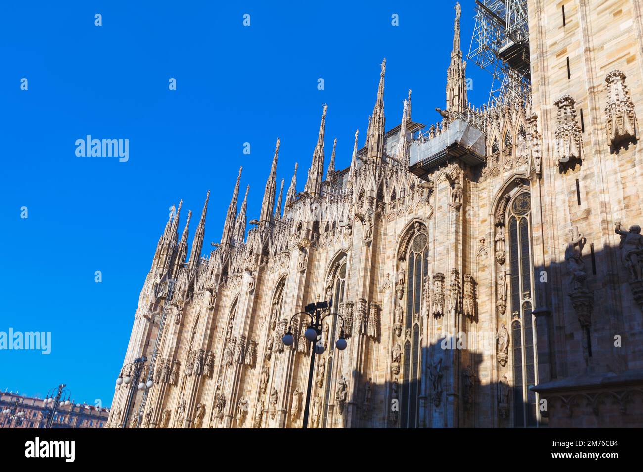 Side view of Duoma in Milan . Gothic architecture of catholic church in ...