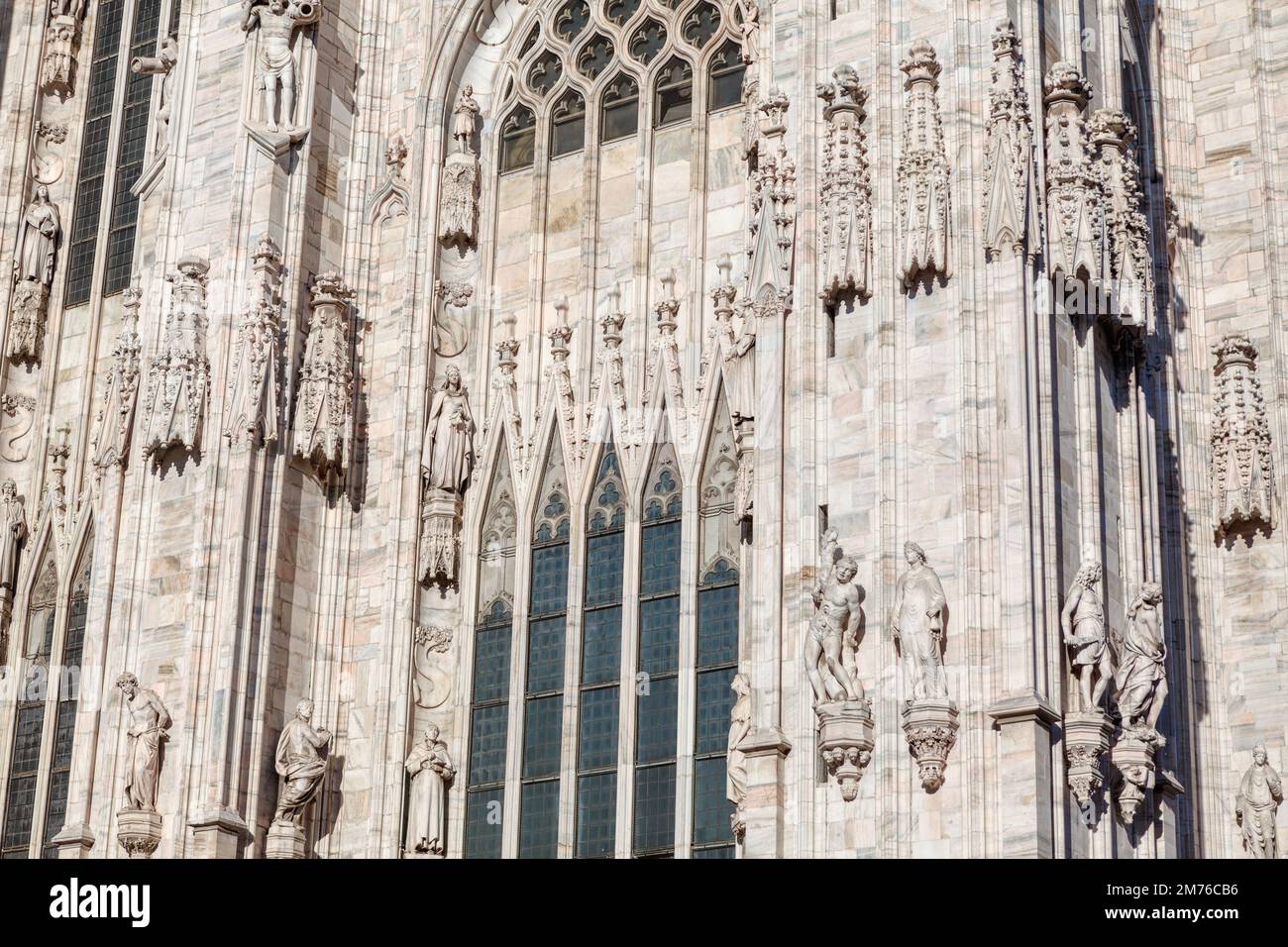 Marble sculptures of Catholic cathedral . White Gothic church in Milan ...