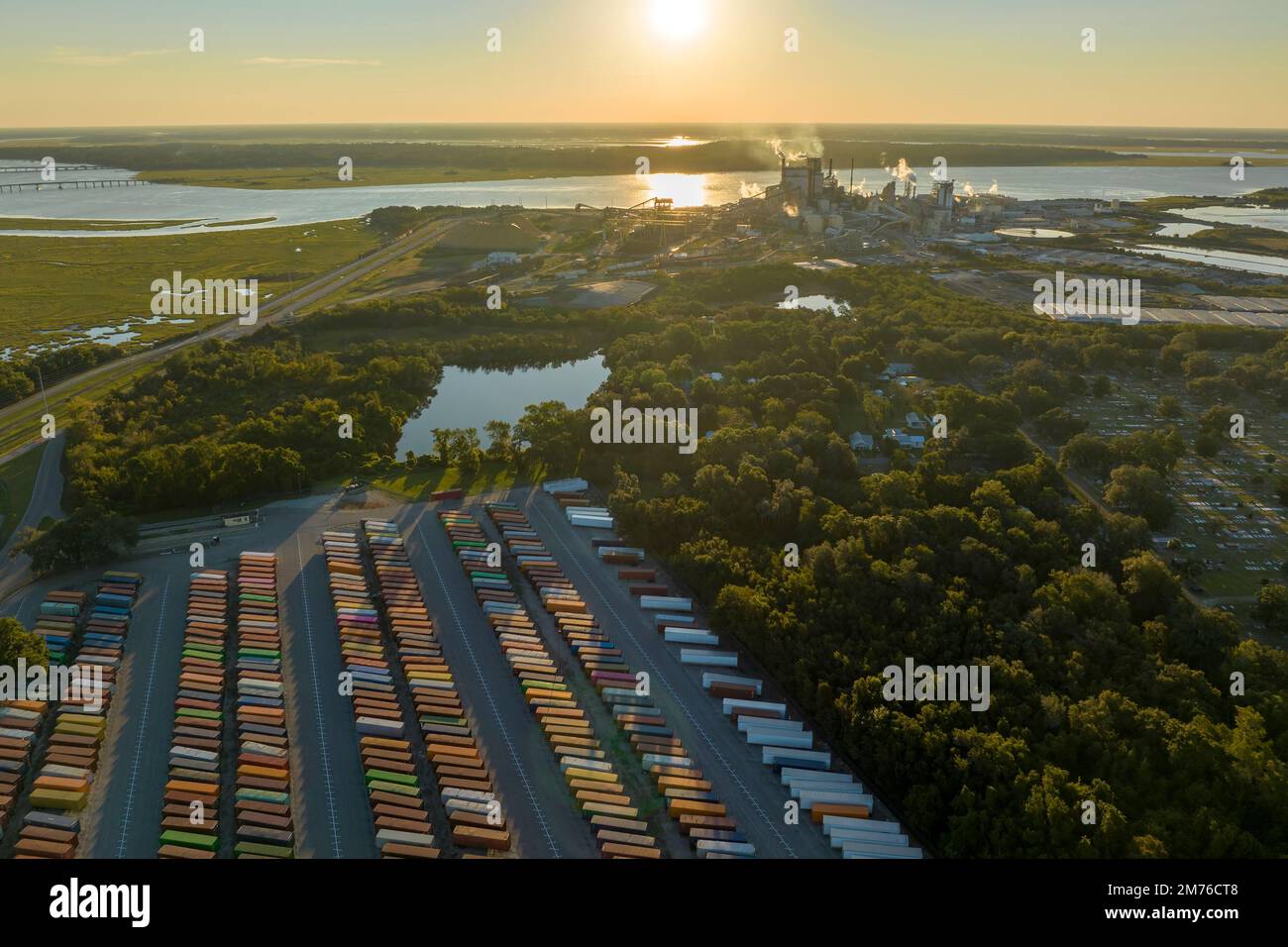 Aerial view of large cargo container yard with rows of freight ...