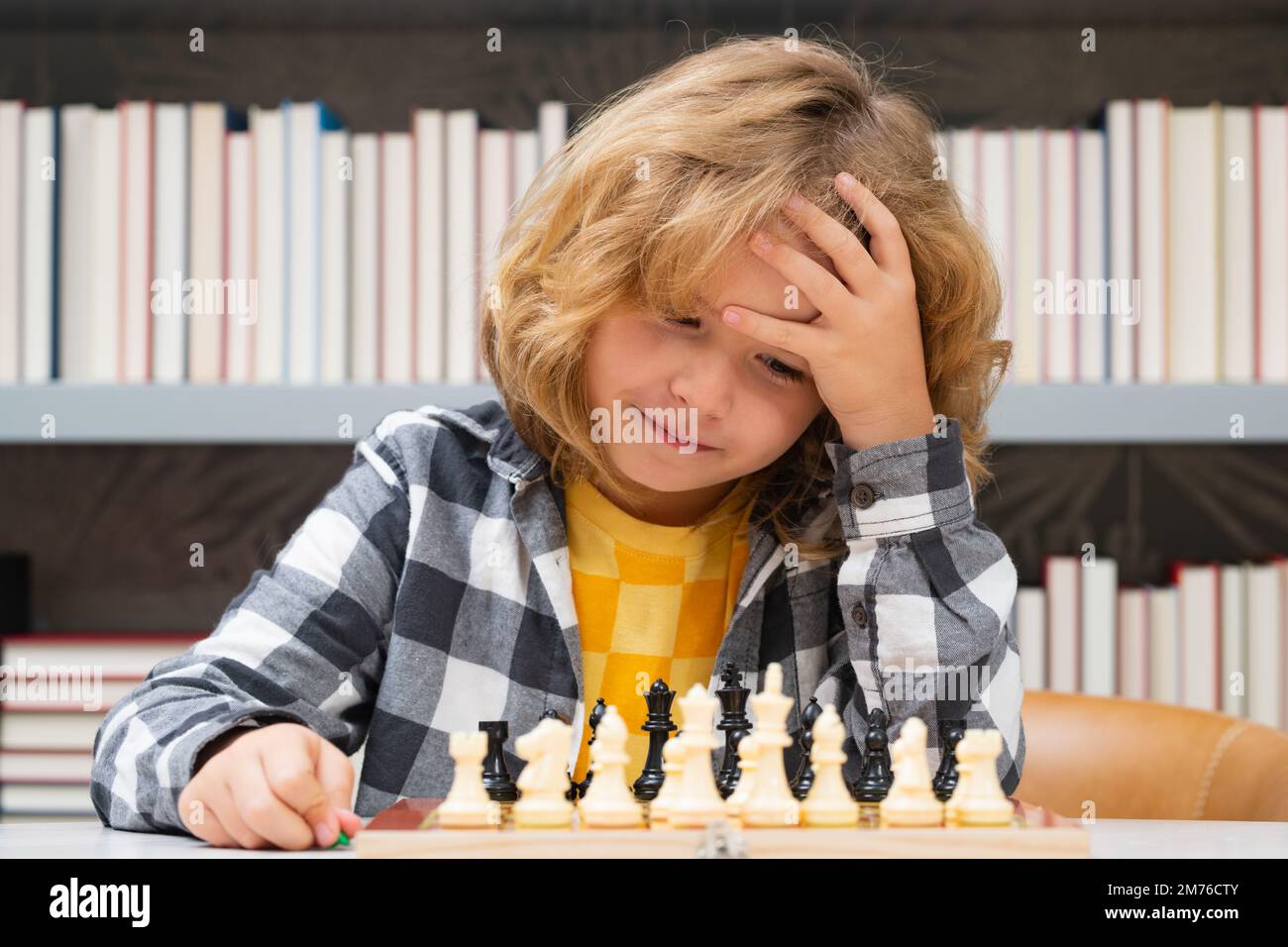 Clever thinking child. Chess for intelligent kid. Child genius, smart ...